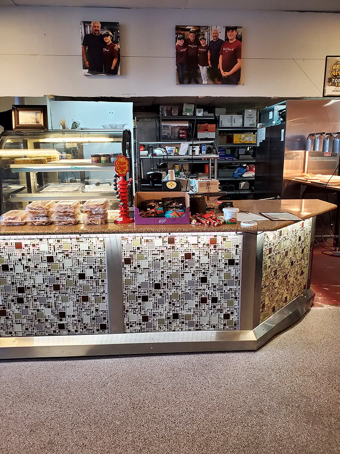 Behind this mosaic-tiled counter, culinary magic happens daily. The display case is like a treasure chest where every choice is the right one.