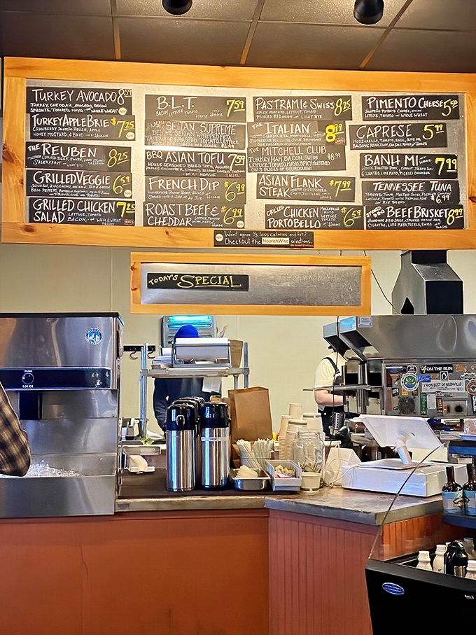 Where the magic happens. That menu board is like a roadmap to happiness, with the Reuben clearly marked as a must-visit destination.