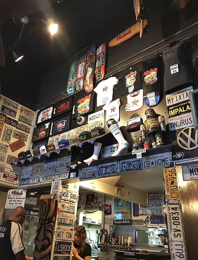 License plates from across America create a road-trip tapestry on the walls &ndash; each one representing someone who came for a burger and left a piece of home.