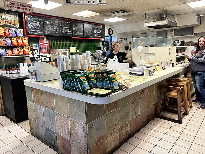 Behind this unassuming counter, sandwich artists work their magic&mdash;no berets or paint-splattered aprons, just skilled hands and perfect timing.