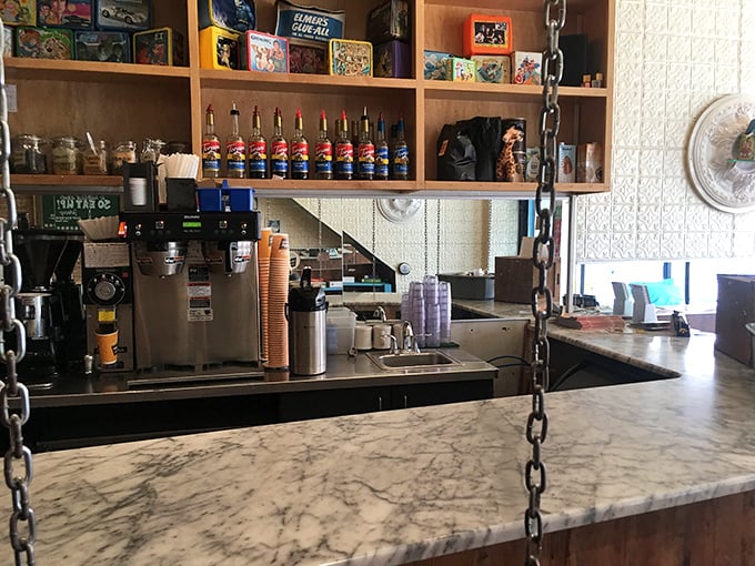 Behind the marble counter, flavor wizardry happens daily. Those syrup bottles aren't just ingredients; they're potions for creating liquid happiness.