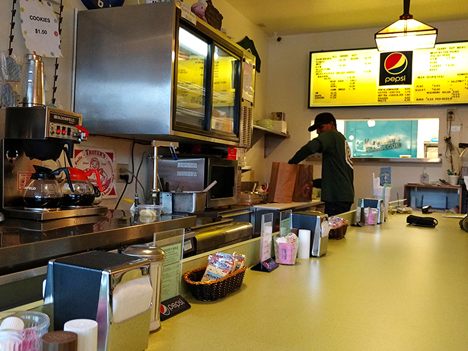 Behind this counter, barbecue magic happens without fanfare. No smoke and mirrors&mdash;well, maybe some smoke, but that's essential.