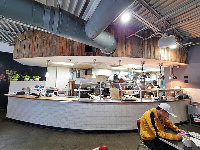 The counter service area&mdash;part open kitchen, part culinary theater&mdash;where breakfast dreams materialize before your eyes.