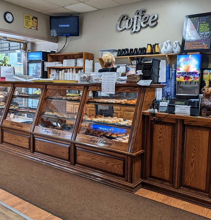 Donut temptation station! The "Coffee" sign isn't just decoration—it's a beacon guiding morning zombies toward revival.