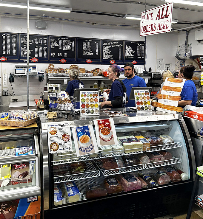 The heart of operations – where sandwich artists and meat maestros transform simple ingredients into Delaware delicacies behind the counter.