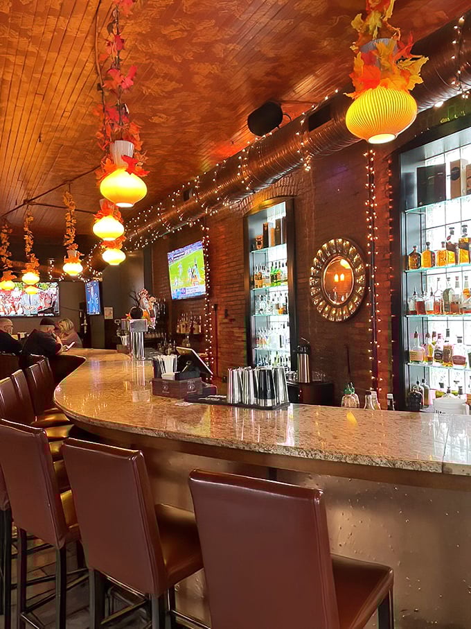 The bar glows with amber lighting and well-stocked shelves&mdash;a warm beacon for craft cocktail enthusiasts and those simply needing a good pour. 