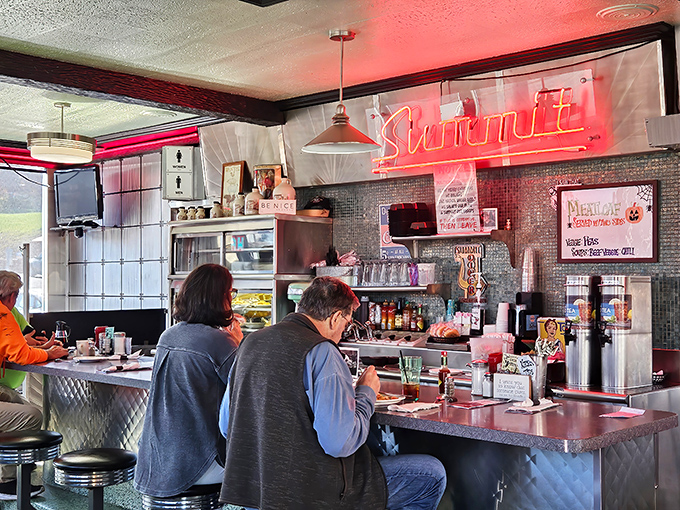 That neon glow whispers "comfort food ahead" in a language universally understood by hungry souls and nostalgic hearts.