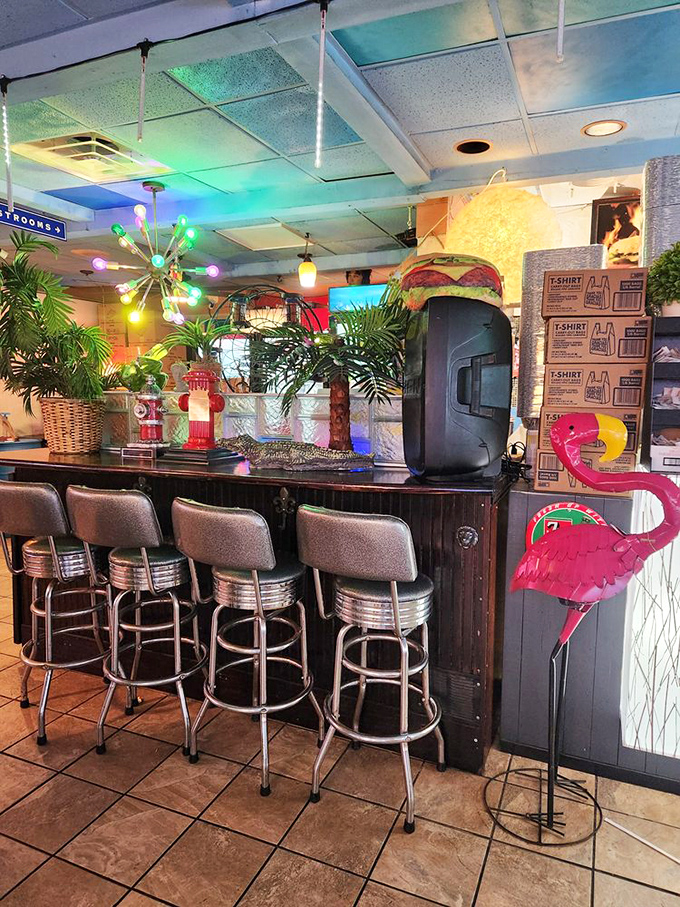 The bar area's colorful lights and flamingo decor channel that "vacation mode" feeling, even when you're just 20 minutes from home. 