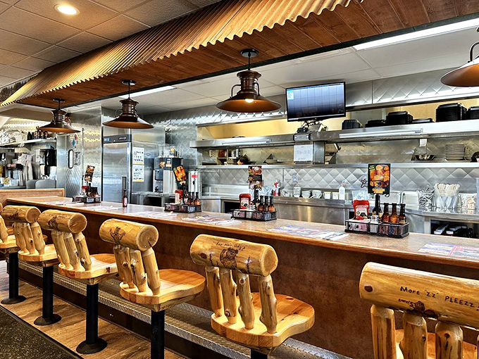 Log-inspired counter seats invite solo diners to perch and watch the breakfast magic happen in a kitchen that knows its way around a griddle.