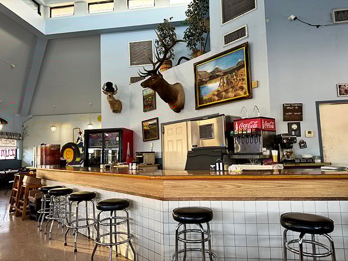 The counter seats offer front-row tickets to the breakfast show—where skilled hands have flipped thousands of perfect pancakes.