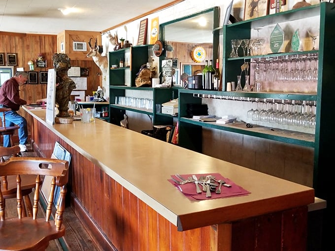 A bar counter that invites elbows and stories, where regulars have worn smooth spots telling tales of the one that didn't get away.