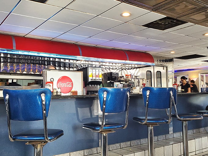 Blue counter seats&mdash;front-row tickets to the greatest show on earth: short-order cooks turning ordinary ingredients into extraordinary memories.