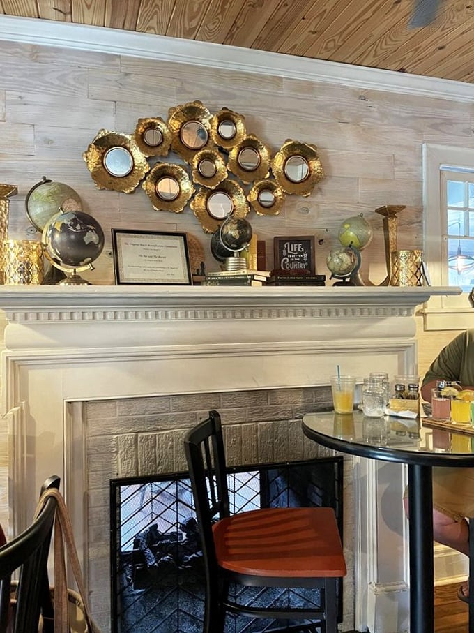 Vintage mirrors and globes create a backdrop that's equal parts sophisticated and whimsical. Breakfast with a side of worldly charm.