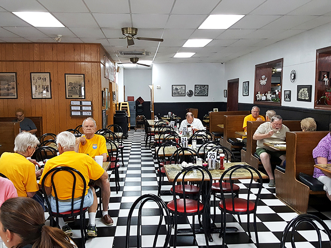 The morning congregation gathers in their yellow shirts. In this church of breakfast, everyone's welcome and livermush is the communion.