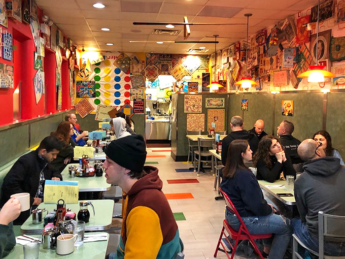A typical morning at Pamela's – strangers becoming temporary breakfast companions in the warm glow of pancake anticipation.