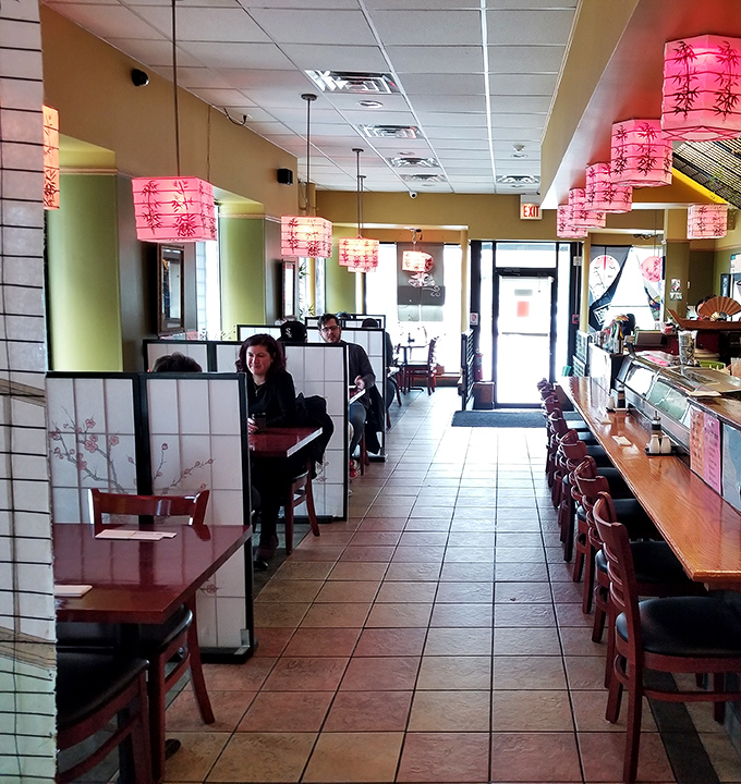 Pink lanterns cast a warm glow over diners, creating the perfect ambiance for both first dates and Tuesday night dinner escapes.