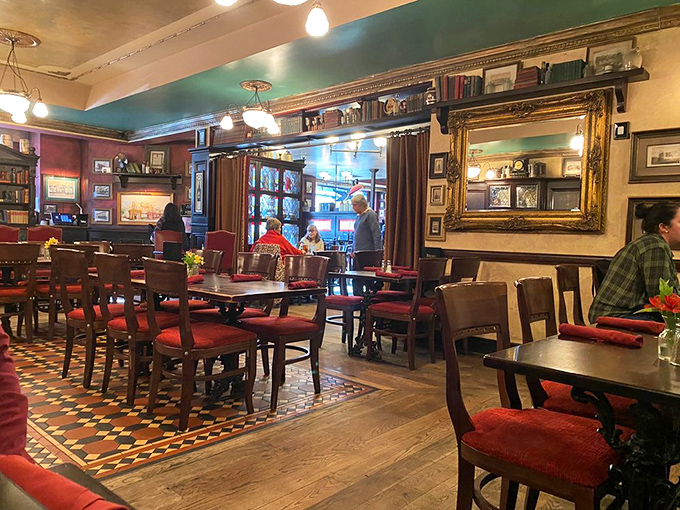 Red walls, wooden tables, and enough Irish memorabilia to make you check your passport&mdash;the dining room where conversations flow as freely as the Guinness.