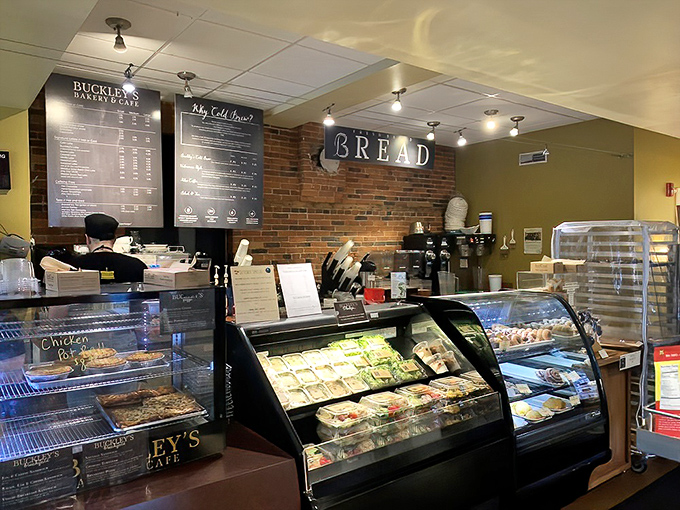 The display case: where willpower goes to die. Each shelf offers a different path to delicious surrender. Choose wisely, or better yet, choose everything.