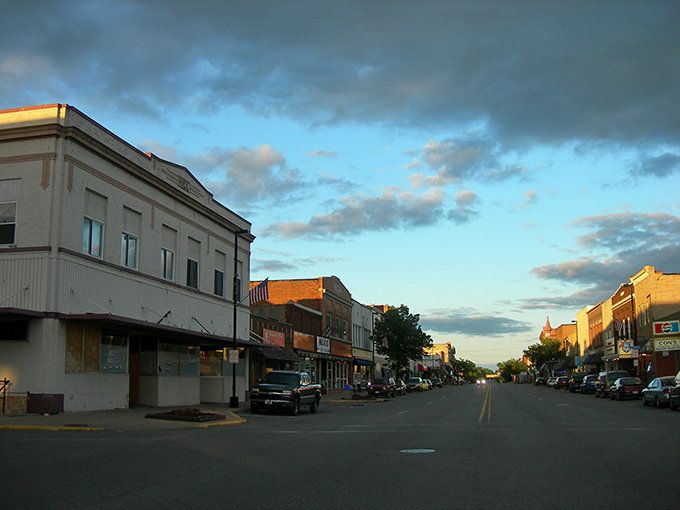 Downtown Antigo at dusk glows with possibility &ndash; when small-town storefronts look their most cinematic and tomorrow's adventures are just hours away.