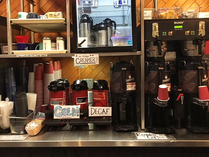 The coffee station&mdash;where morning dreams are brewed and second chances at humanity are dispensed with free refills for dine-in customers.
