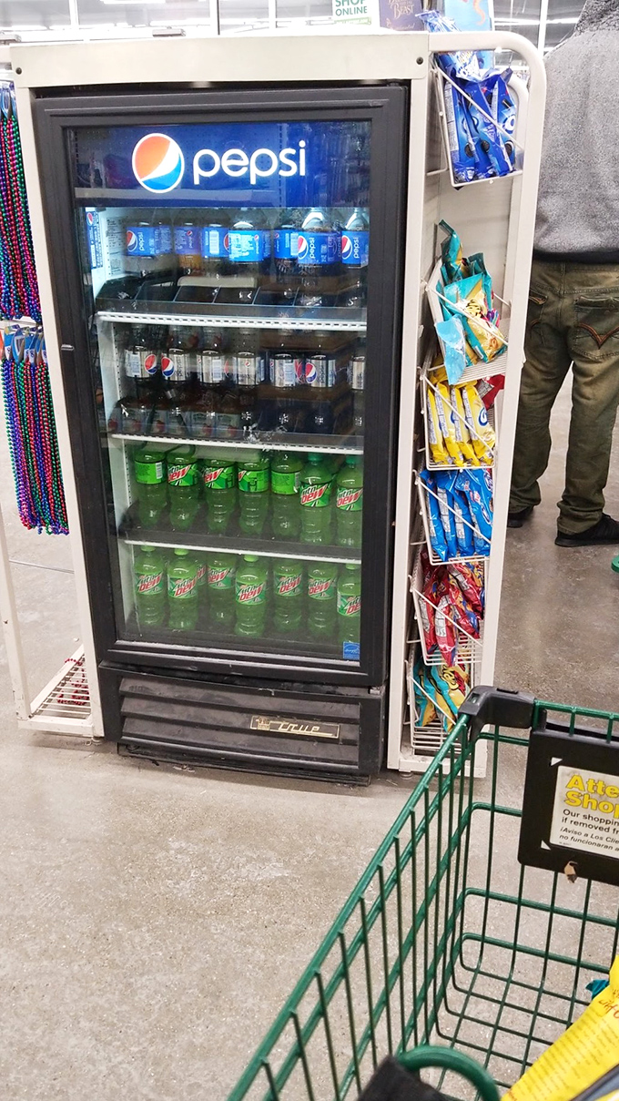 The Pepsi cooler stands guard near the checkout—because shopping works up a thirst that only ice-cold beverages can quench.