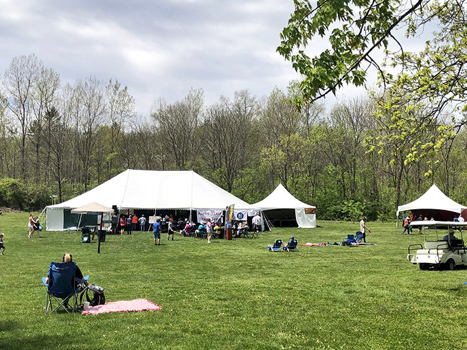 Community comes alive under canvas tents at Highbanks events, where strangers become neighbors over shared appreciation for the outdoors.