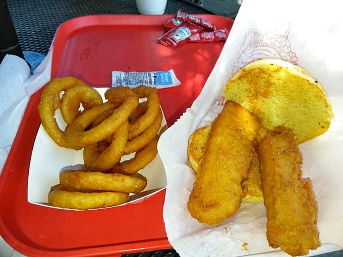 Fish sandwich and onion rings &ndash; the Midwest's answer to fish and chips, served on a cheerful red tray that brightens even the cloudiest Ohio day.