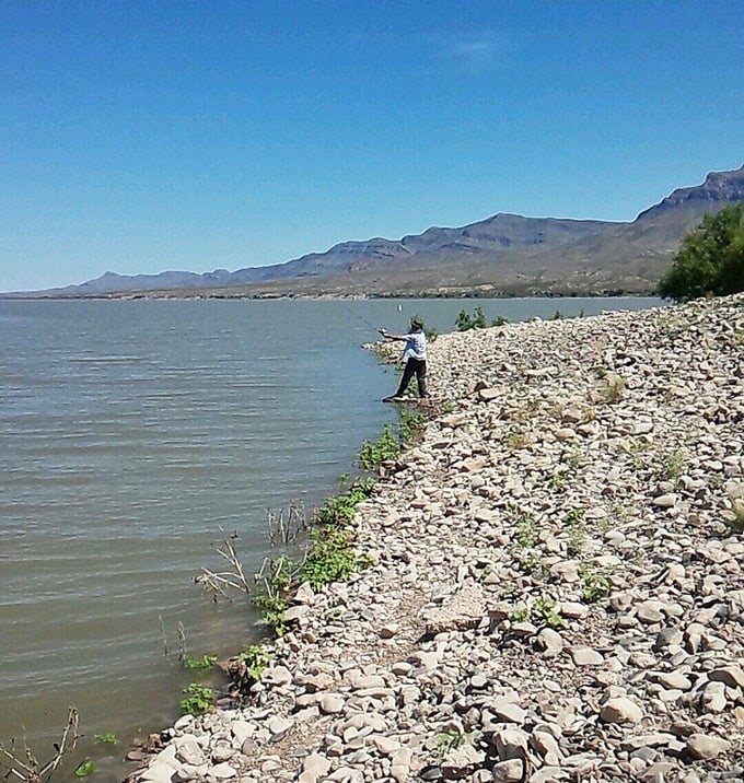 Fishing at Elephant Butte Lake provides both recreation and meditation, with mountains creating a backdrop worthy of a desktop wallpaper.