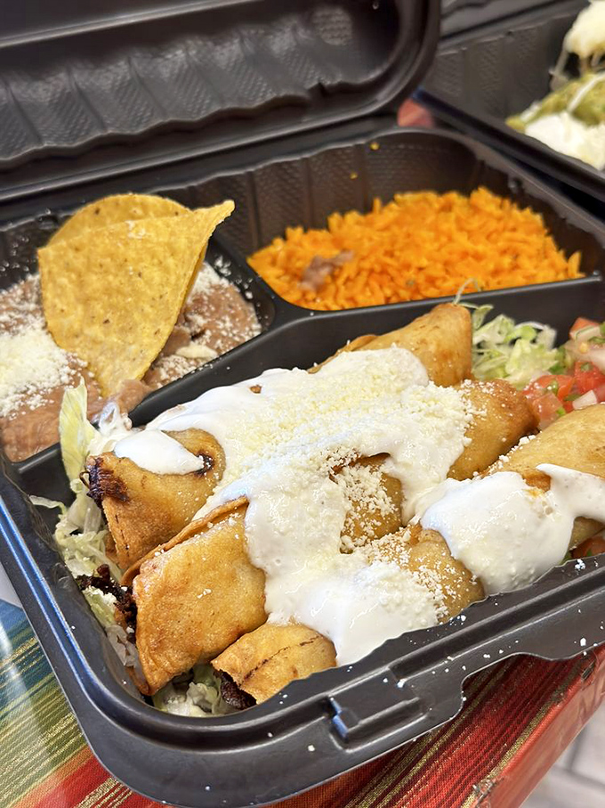 Flautas standing at attention, crispy soldiers ready for duty. The crunch is audible three tables away&mdash;and worth every decibel.