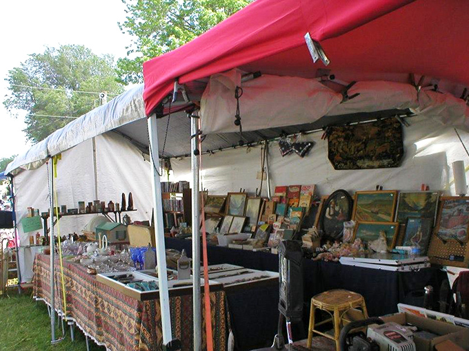 A tent filled with framed artwork and collectibles offers everything from kitschy prints to hidden masterpieces waiting for the right eye.