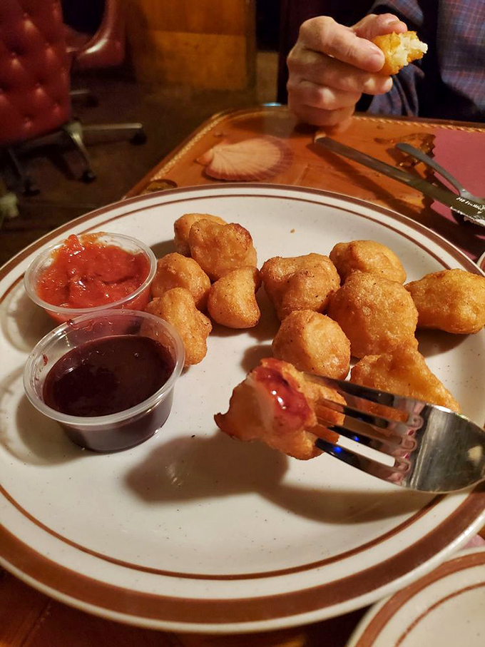 Golden-fried cauliflower bites that make you forget you're technically eating vegetables. That dipping sauce isn't optional&mdash;it's mandatory.