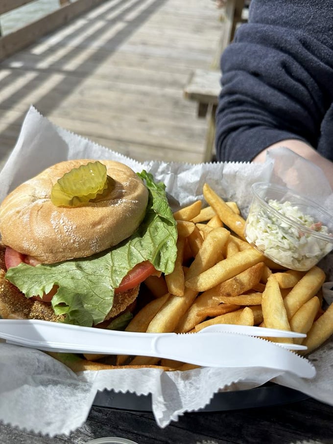 A fried fish sandwich that makes fast food versions weep with inadequacy. That pickle on top isn't garnish &ndash; it's the exclamation point on a perfect sentence.