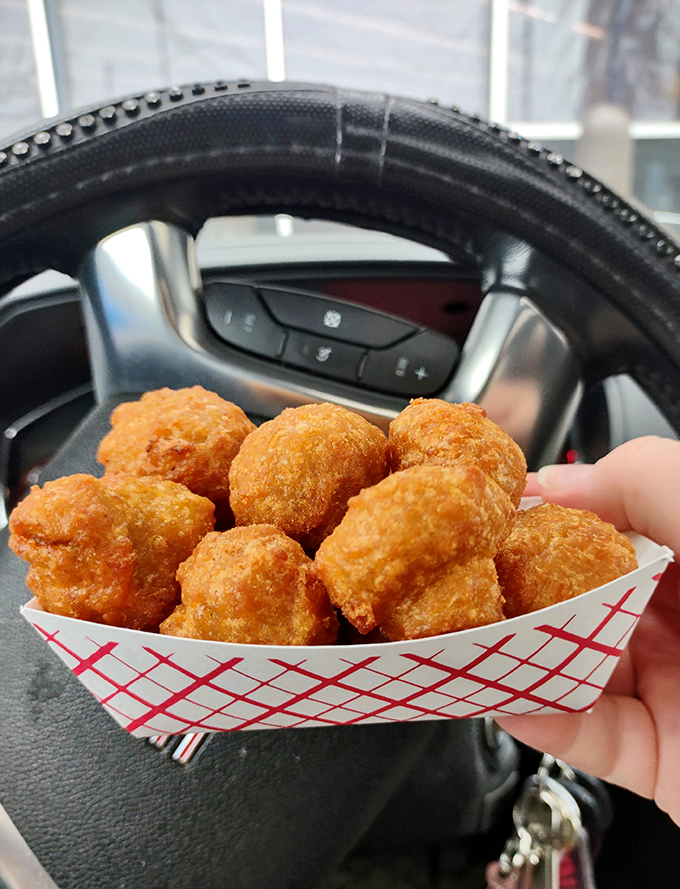 Fried mushroom poppers that look like they're being enjoyed in the comfort of a car&mdash;the original dining room of American fast food culture.