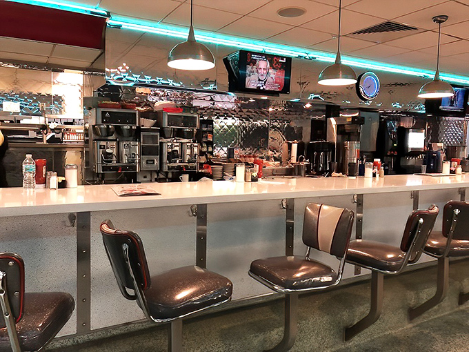 The beating heart of diner operations&mdash;where coffee is always brewing and the short-order ballet unfolds with practiced precision.