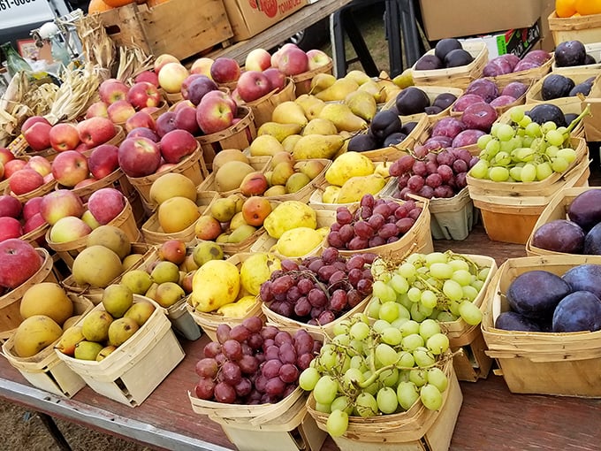 Nature's candy displayed in rustic baskets. These aren't your supermarket fruits&mdash;they're conversation pieces with flavor to match.