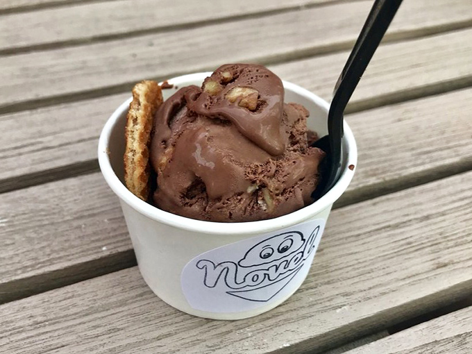 Chocolate contemplation in a cup. This fudgy masterpiece demands a moment of silence before the inevitable symphony of spoon scraping.