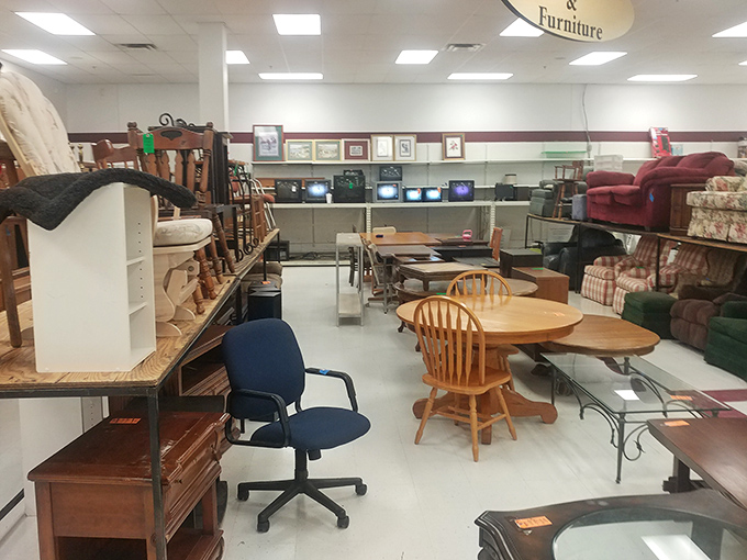 The furniture section: where vintage charm meets practicality. That wooden table has probably hosted more interesting conversations than most talk shows.