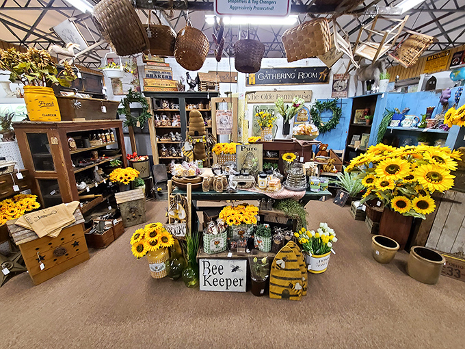 A sunflower-themed booth that practically buzzes with cheerful energy. Bee-themed decor never looked so honey-sweet against vintage wooden crates.