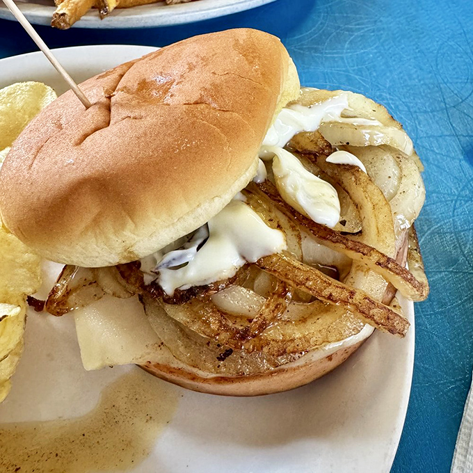 Grilled bologna and onions&mdash;proof that sometimes the humblest ingredients make the most satisfying sandwiches. Childhood, upgraded.