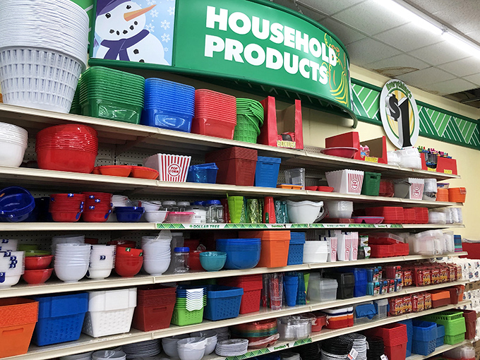 Snowman signage watches over a sea of colorful bowls and containers. Kitchen essentials arranged like a plastic rainbow, ready to organize chaotic cupboards everywhere.