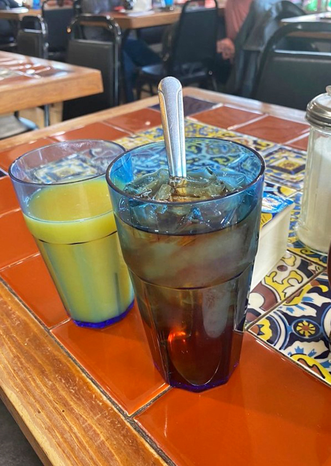 Iced tea so refreshing it could end arguments, sitting alongside orange juice that actually tastes like fruit instead of memories of fruit.