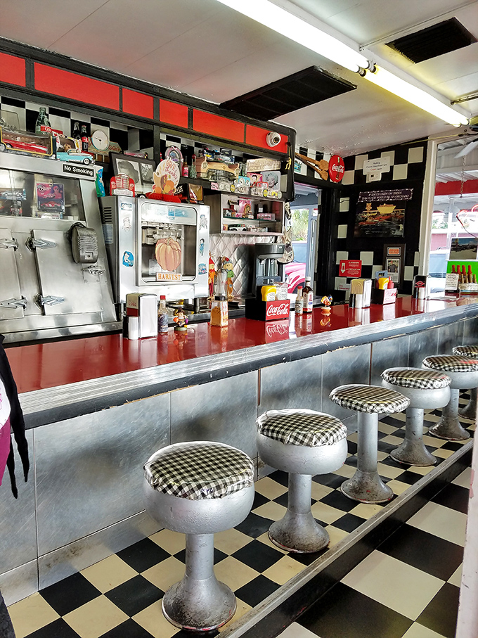 The counter view&mdash;where burger magic happens in plain sight. No secrets here, just decades of griddle wisdom and the sizzle of anticipation. 