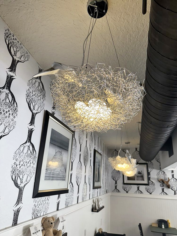 Nest-like light fixtures cast a warm glow over diners, creating an atmosphere that's both modern and cozy&mdash;like dining in a stylish friend's home.