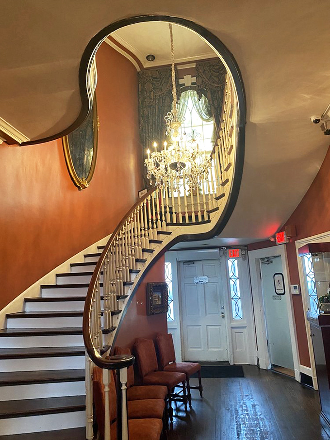 That staircase isn't just architectural splendor&mdash;it's what you'll need to climb after consuming three helpings of everything on the table.