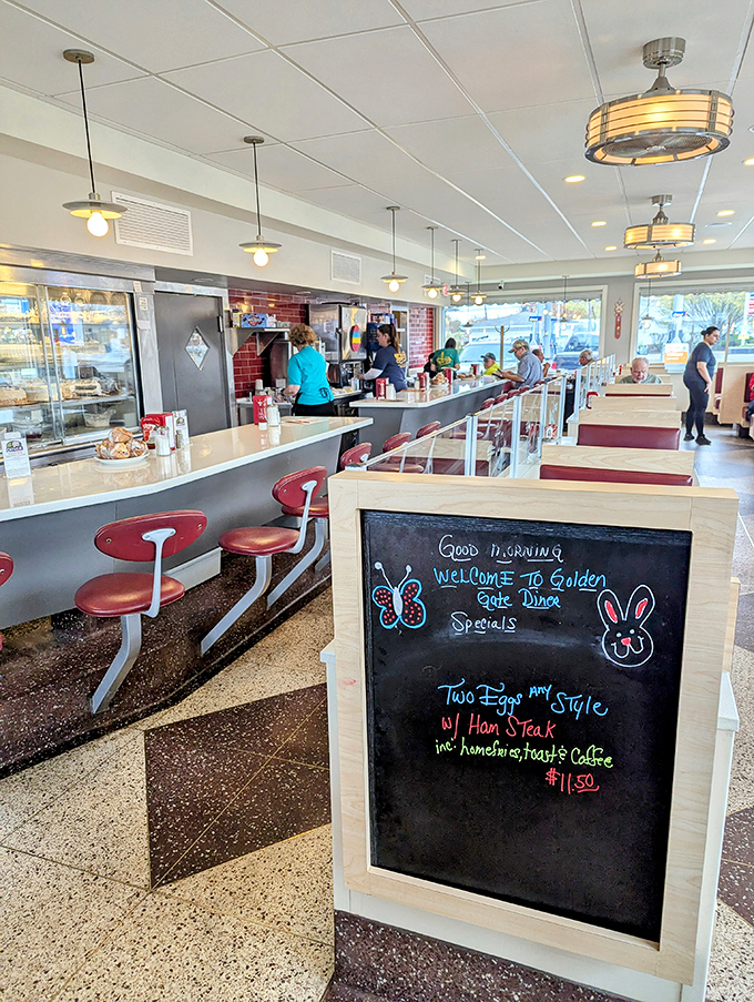 Counter seating where strangers become temporary breakfast companions, united by the universal language of "pass the syrup, please."
