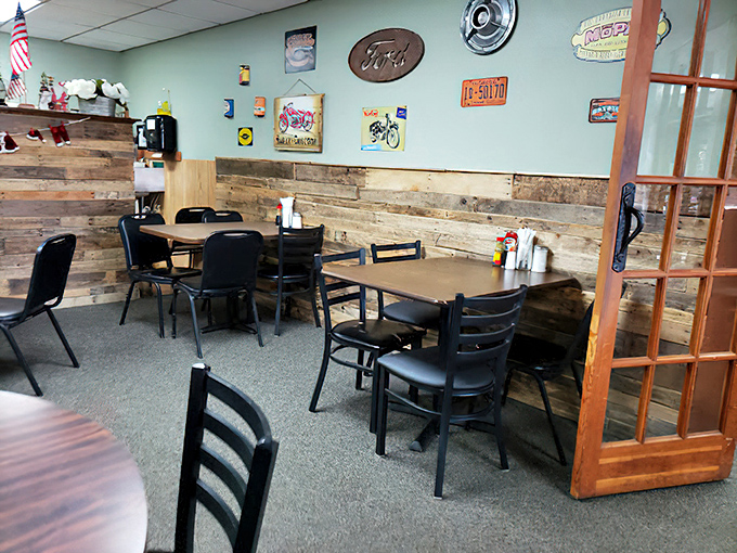 Vintage signs and reclaimed wood paneling create an atmosphere that says, "Slow down, stay awhile, and have another helping."