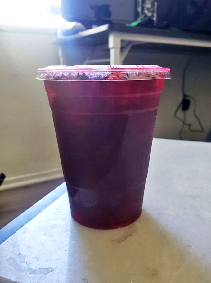 The mysterious purple drink&mdash;a sweet interlude between seafood courses that makes your mouth both curious and grateful.