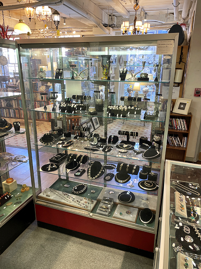 Gleaming estate jewelry displayed under glass&mdash;each piece with its own secret history of special occasions, celebrations, and perhaps a touch of scandal.