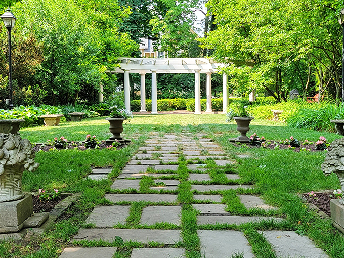 Garden pathways leading to moments of quiet contemplation. Stone steps and white columns create a backdrop worthy of your next family photo or impromptu poetry session.
