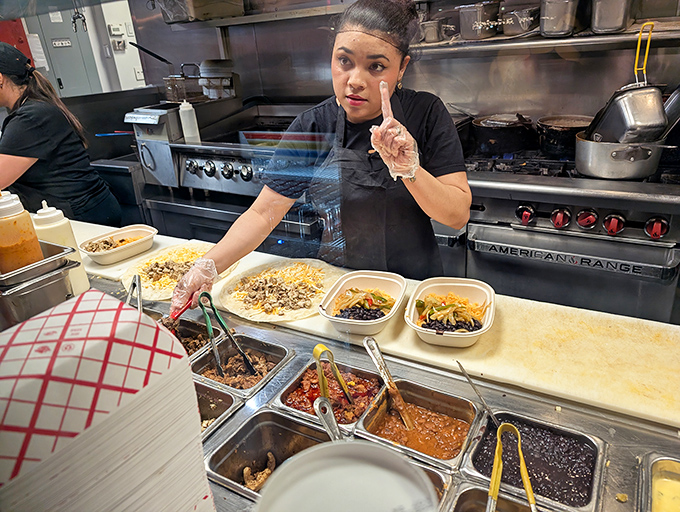 Behind the scenes magic: fresh ingredients lined up like soldiers ready for duty in the culinary battlefield of El Jefe's open kitchen.
